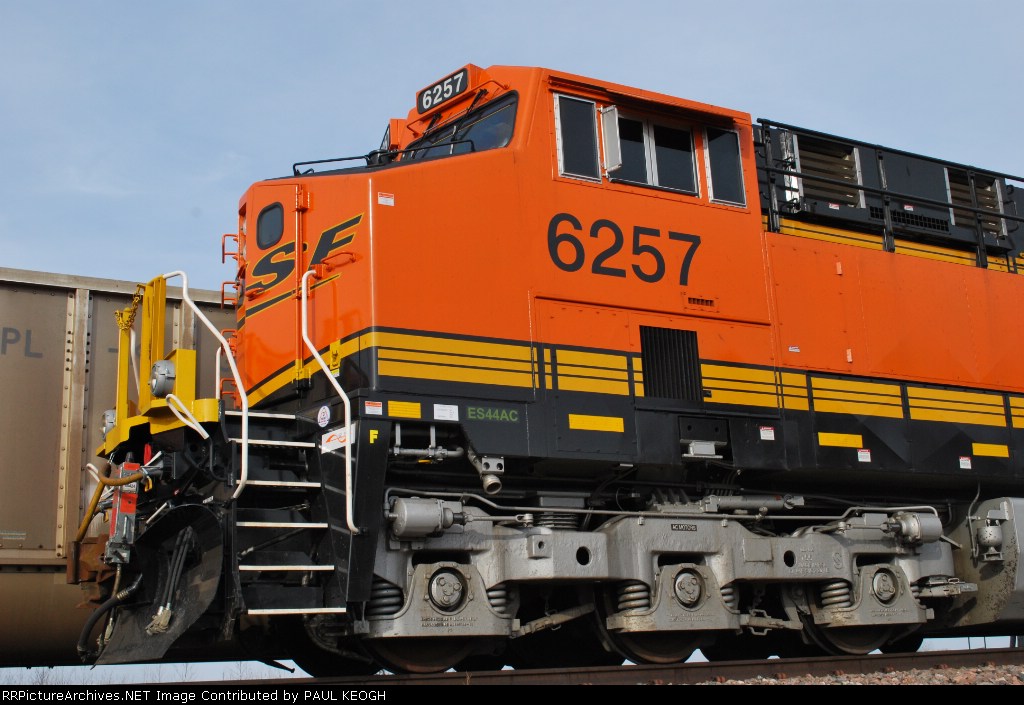 BNSF 6257 close up shot of the left side of the crew cab/notice the end of train device attached ...